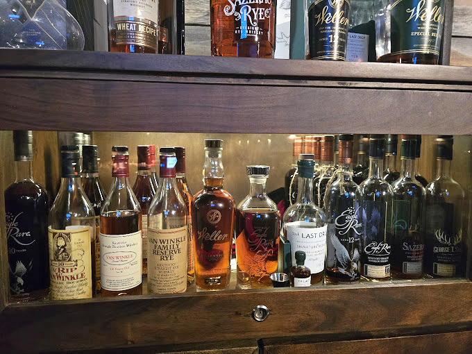 A whiskey collection that would make bourbon country proud. These bottles aren't just decoration&mdash;they're liquid personality waiting to be poured.