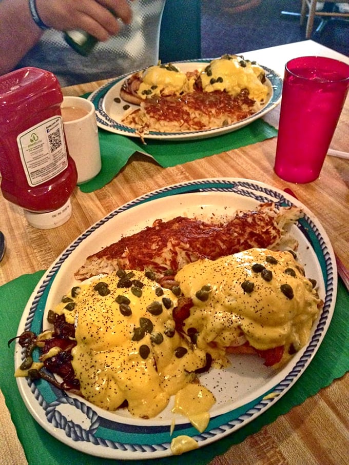 Eggs Benedict with capers &ndash; where hollandaise sauce flows like liquid gold over perfectly poached eggs. This is breakfast worthy of your Sunday best.