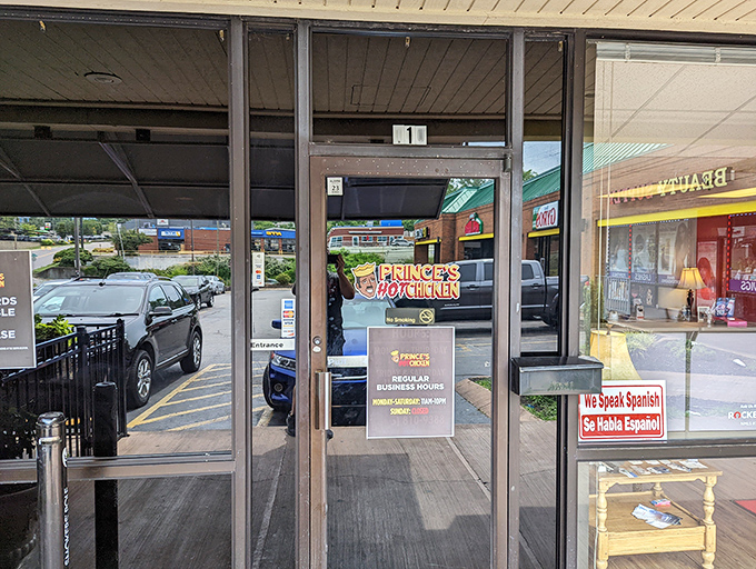 The entrance to Prince's&mdash;where countless brave souls have entered with confidence and exited with newfound respect for the power of cayenne.