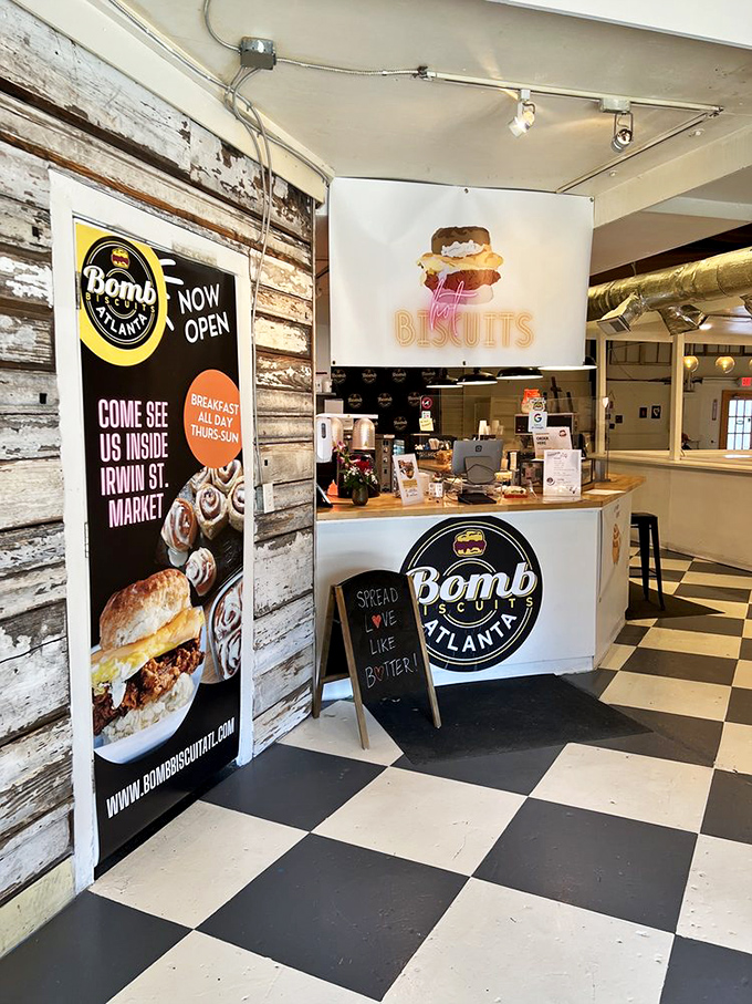 The black and white checkered floor leads to a counter promising carb-laden bliss. That chalkboard sign speaks the truth about butter.