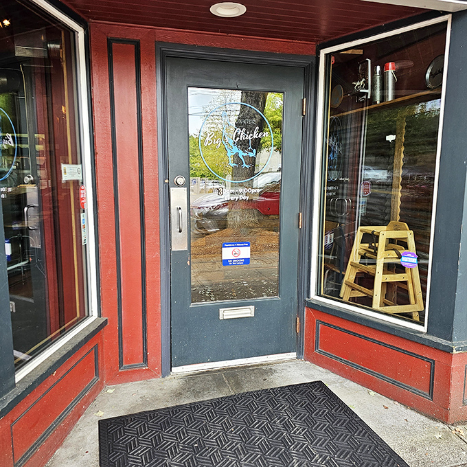 The entrance to chicken paradise doesn't need to be fancy. That blue neon sign is the culinary equivalent of "follow the yellow brick road."