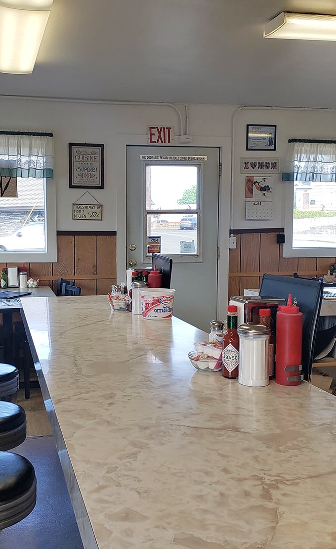 The counter view reveals the essentials of diner life: sugar, ketchup, and Tabasco&mdash;the holy trinity of breakfast condiments.