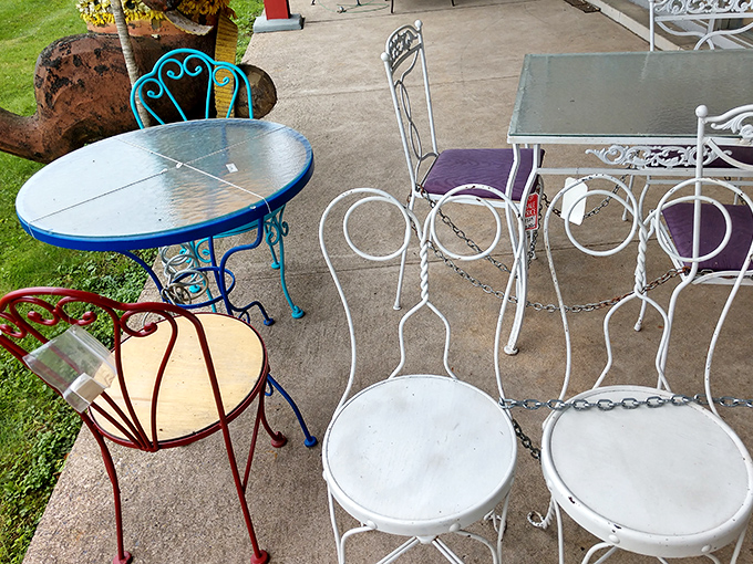 Outdoor furniture with more personality than most party guests. That turquoise bistro set isn't just weather-resistant—it's conversation-starting.