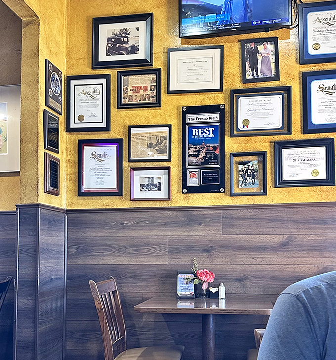 The wall of accolades isn't just decoration&mdash;it's a timeline of community love and recognition that speaks louder than any social media influencer could.