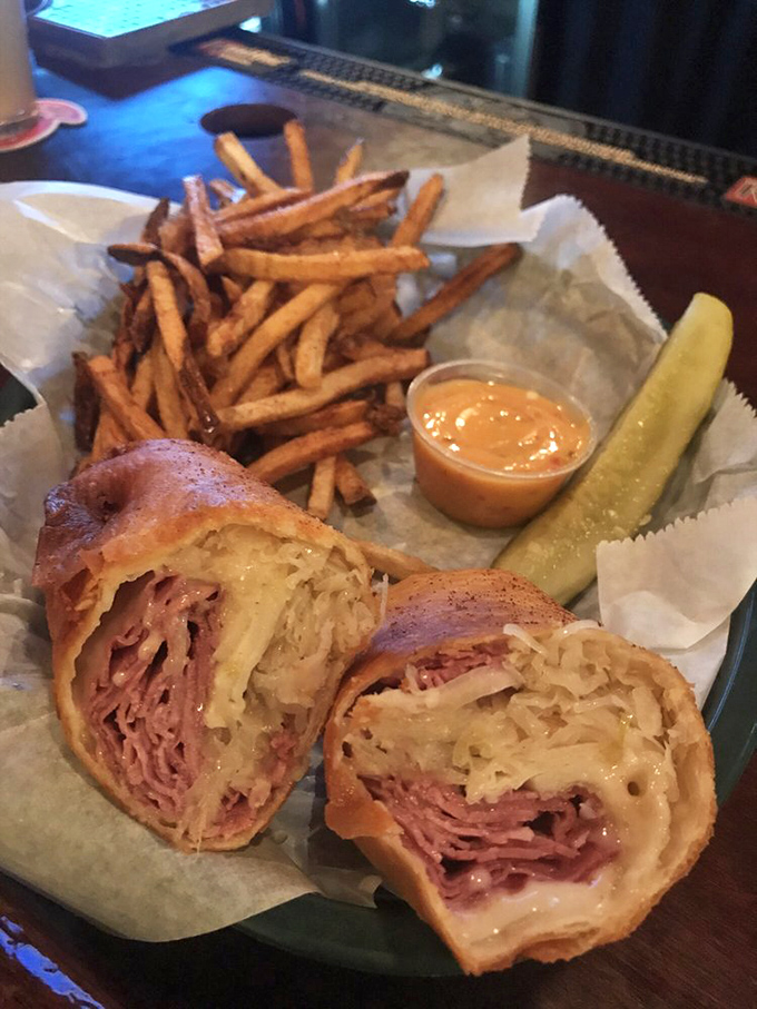 The Reuben reimagined as a crispy, golden torpedo of flavor. Whoever thought to fry this sandwich deserves a Nobel Prize in Deliciousness.