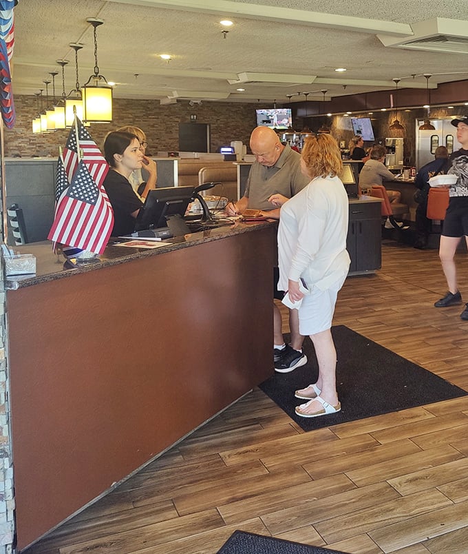 The front desk&mdash;first checkpoint on your journey to comfort food nirvana, complete with American flags that remind you this is democracy in delicious action.