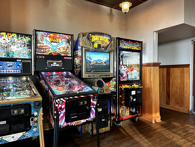 The arcade corner proves that pinball wizards need proper fuel too. Nothing says "I'm adulting" like playing games after demolishing a stack of pancakes.