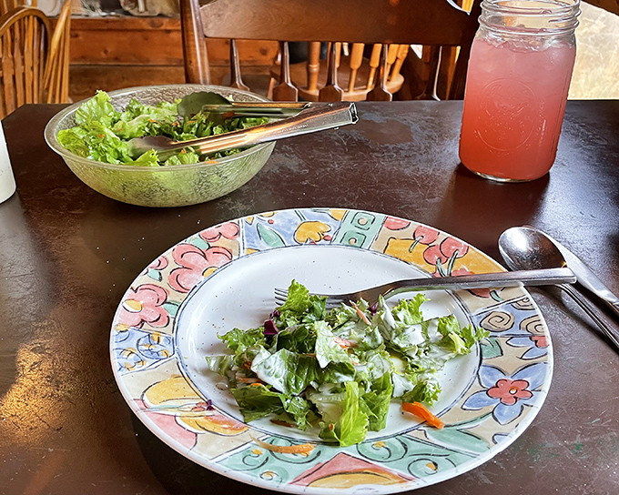 The salad might seem like an afterthought, but this crisp greenery provides the perfect counterpoint to the protein parade that follows.