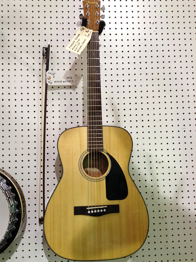 Six strings and countless songs later, this guitar waits patiently for its next musical chapter to begin.