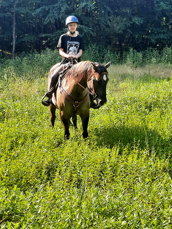 Horseback riding through meadows adds a touch of Western romance to Pennsylvania's woodlands. This young equestrian found the park's alternate transportation system.