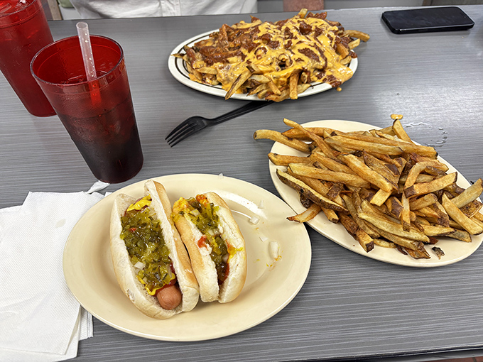 The classic combo that launched a thousand road trips. These relish-topped dogs and golden fries are what fast food dreams to be when it grows up.