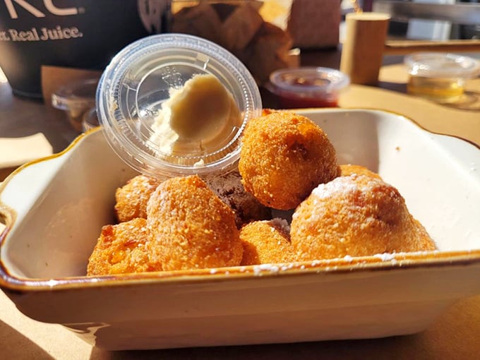 Golden-fried hush puppies that crunch then melt in your mouth. These little spheres of cornmeal joy are the unsung heroes of any seafood feast.