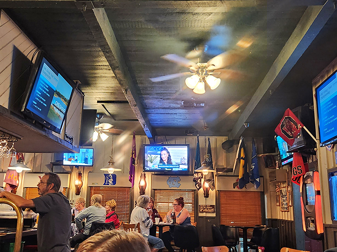 Multiple TVs ensure you won't miss a play, while the ceiling fans keep the energy high and the temperature just right.