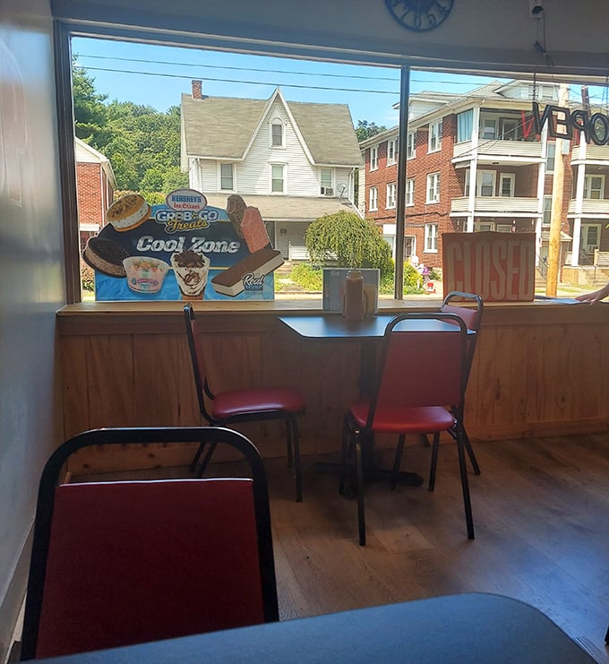 A window seat with a view of the neighborhood—the perfect spot to contemplate life's big questions while demolishing a legendary sandwich.