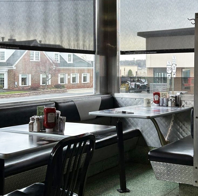 Window seats offer prime people-watching with a side of nostalgia. The quintessential small-town diner view hasn't changed in decades.