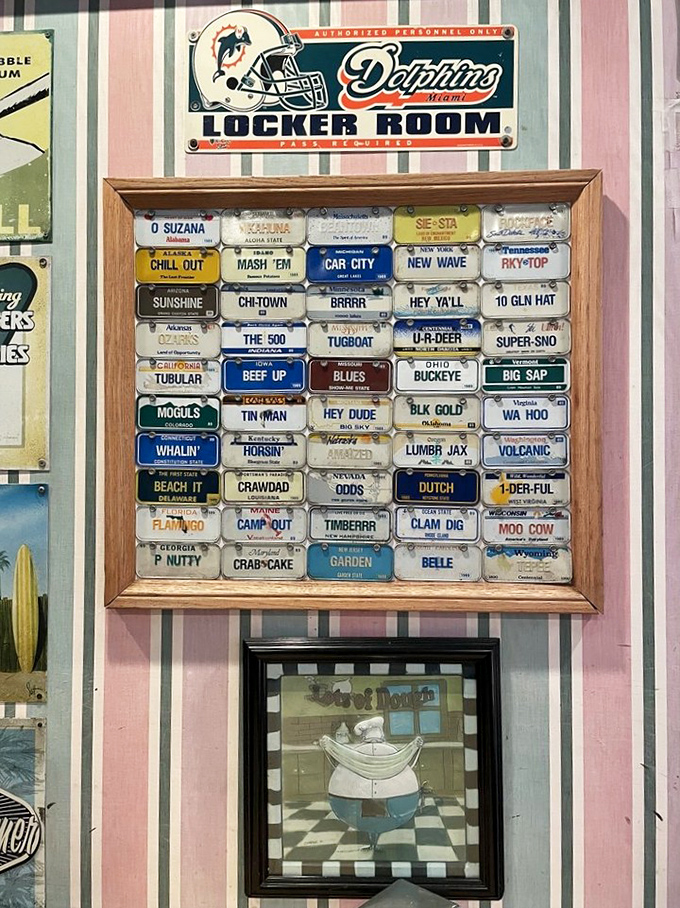 A museum of American road culture. This framed collection of miniature license plates tells stories of travels across the country.