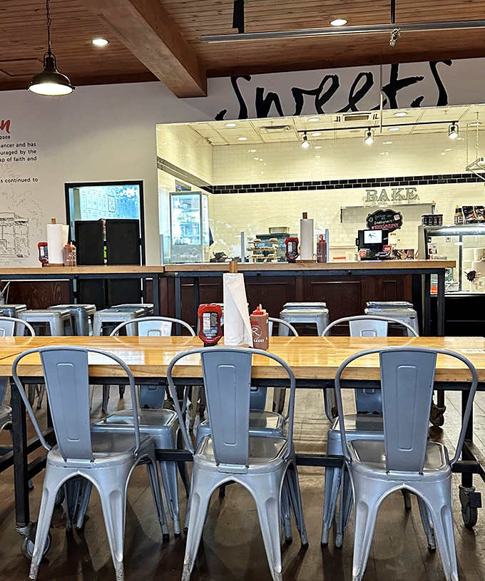 Metal chairs, wooden tables, and a glimpse of the Sweet Shop in the background &ndash; where you'll head after convincing yourself you deserve dessert.