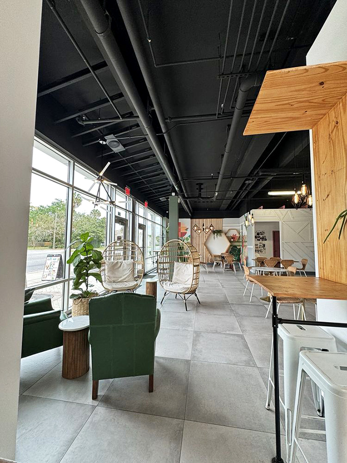 Egg chair cocoons and potted plants create conversation nooks where you can contemplate the meaning of life or just your next coffee refill.