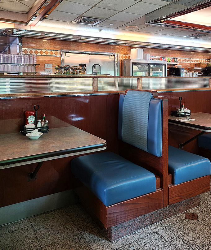 The booth&mdash;that sacred space where countless conversations, first dates, and family meals have unfolded over decades of Lancaster Avenue history.