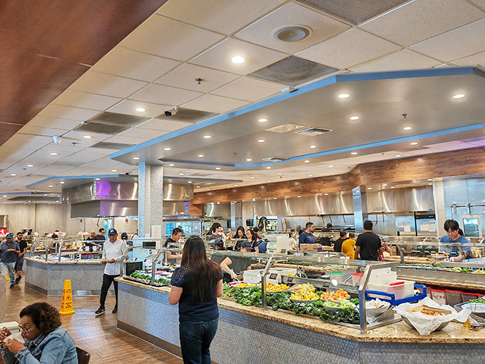 The buffet line stretches like a culinary yellow brick road, leading hungry patrons to delicious discoveries around every corner.