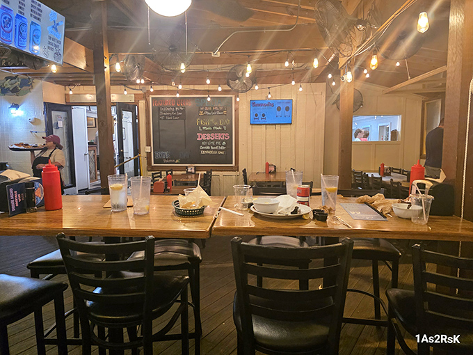 String lights, wooden tables, and that relaxed vibe where nobody's checking their watch &ndash; the dining room feels like a coastal living room.