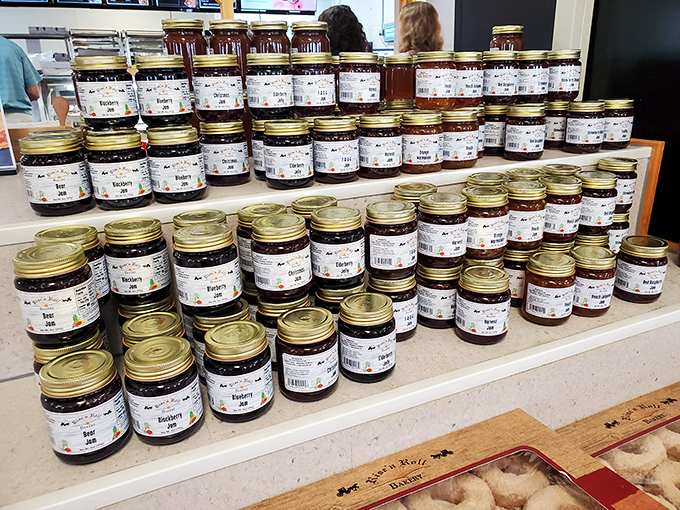 Jars of homemade jams and preserves stand in formation like delicious soldiers, ready to transform ordinary toast into extraordinary experiences.