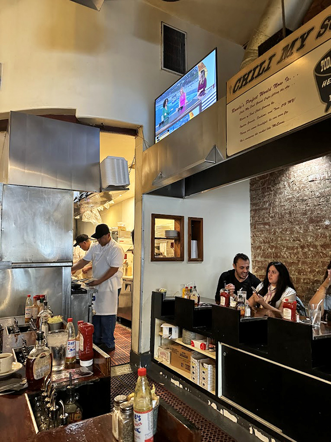 Where breakfast dreams come true: The open kitchen design lets you witness the symphony of spatulas and sizzle that produces those legendary pancakes.