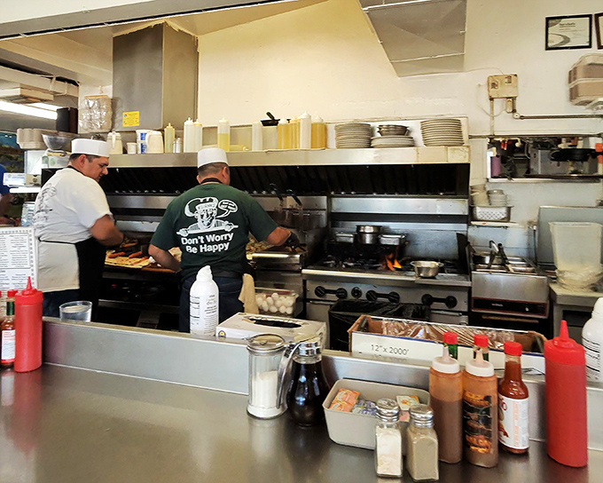 Behind the scenes, where the "Don't Worry Be Happy" philosophy is backed by serious cooking skills and decades of experience.