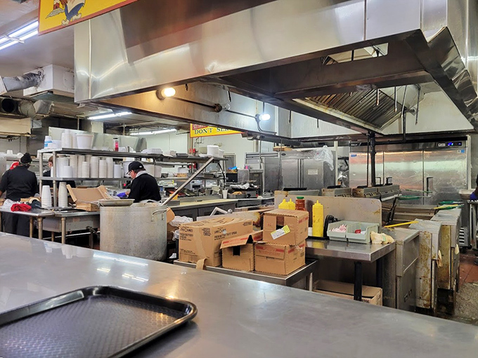 Behind the scenes where burger dreams come true. This kitchen has probably seen more action than most Hollywood sets, and with better reviews.
