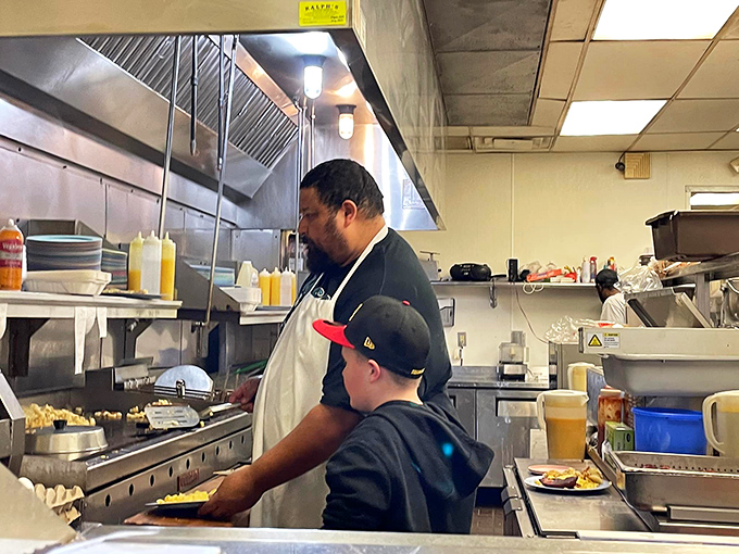 Behind the scenes, skilled hands create morning magic with the precision of seasoned breakfast artists.