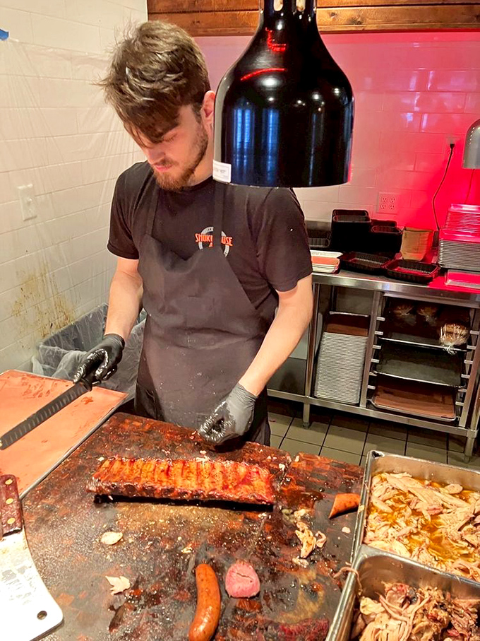 Behind the scenes magic where smoke meets meat. This pitmaster's hands should be insured like a concert pianist's&mdash;they're creating edible symphonies. 