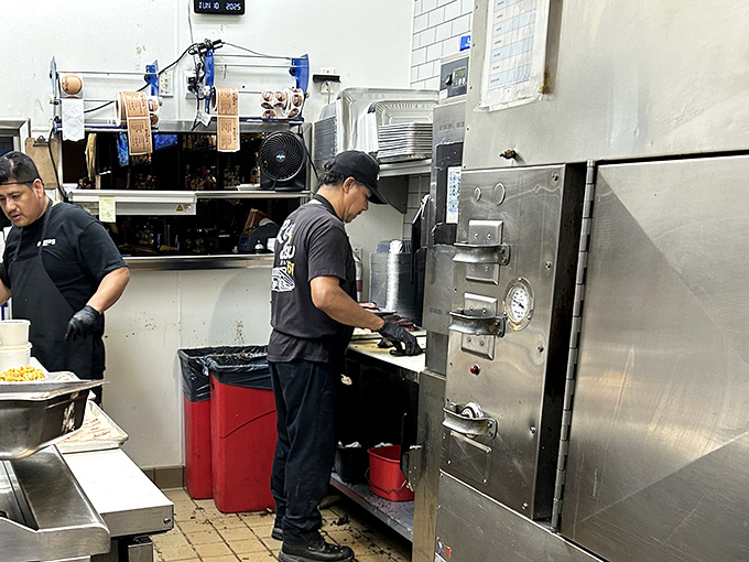 Behind the scenes, pitmasters work their magic with smokers that have probably seen more meat than a butcher's convention.