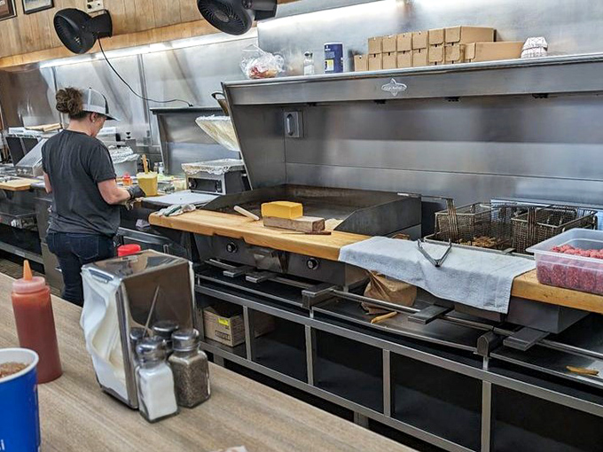 Behind the scenes at cheese heaven. Like watching Michelangelo paint, except with spatulas and much better smelling.