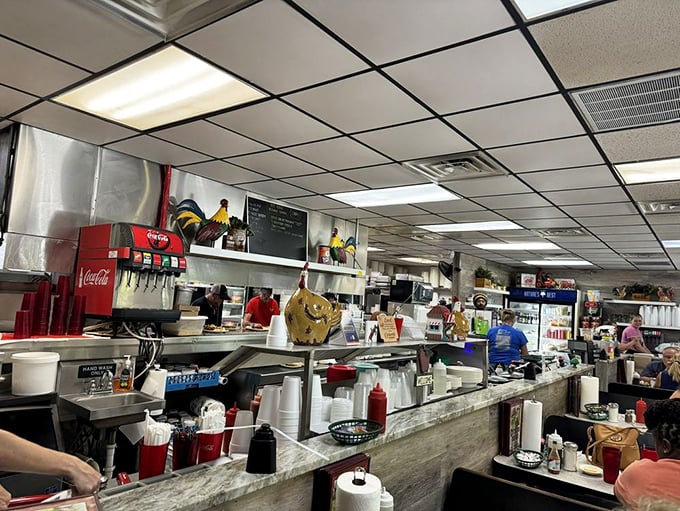 Behind the counter, where diner dreams become reality. The choreographed chaos of a busy kitchen is performance art for the hungry.
