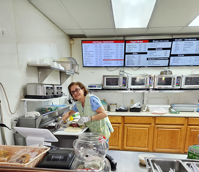 Where sandwich magic happens. This kitchen view reveals the workshop where ordinary ingredients transform into extraordinary meals.