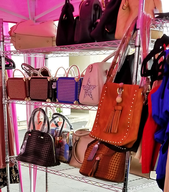 Handbag heaven for accessory aficionados. That orange tassel bag is practically screaming to be taken to brunch and shown off.