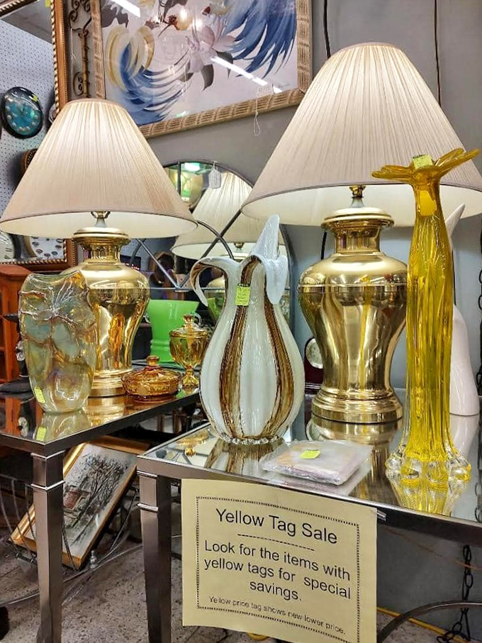 Brass lamps that would make Aladdin jealous stand sentinel over yellow-tagged bargains. Mid-century glamour meets modern treasure hunting.