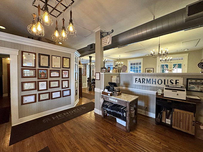 The lobby area showcases awards and farmhouse charm&mdash;visual proof that you've made an excellent dining decision before you've even seen a menu.