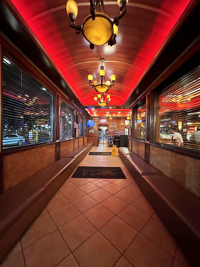 The entrance hallway glows with a red ceiling that says, "Abandon your diet, all ye who enter here"&mdash;a delicious warning of what's to come.