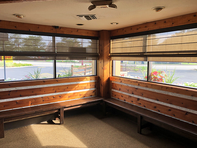 Waiting areas aren't usually worth mentioning, but this one feels like your cabin-owning friend's living room. Those windows frame the outside world like paintings.