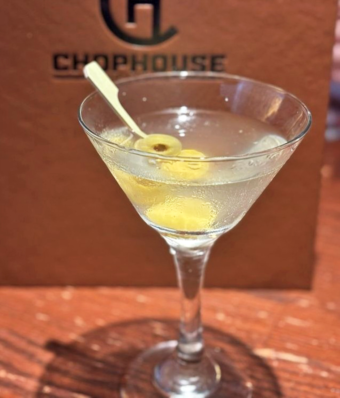 A martini so pristine it makes James Bond look sloppy. That olive isn't just garnish&mdash;it's punctuation on a liquid sentence.