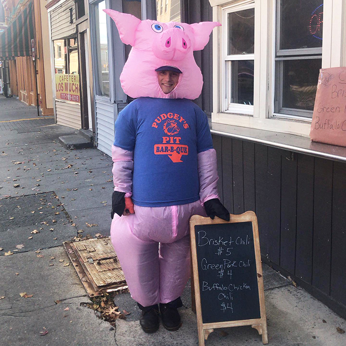 When your mascot costume perfectly captures your business philosophy: "We're serious about barbecue, but not about ourselves."