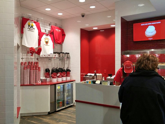 Even the merchandise corner maintains the signature red and white color scheme &ndash; because true fans want to wear their donut allegiance.