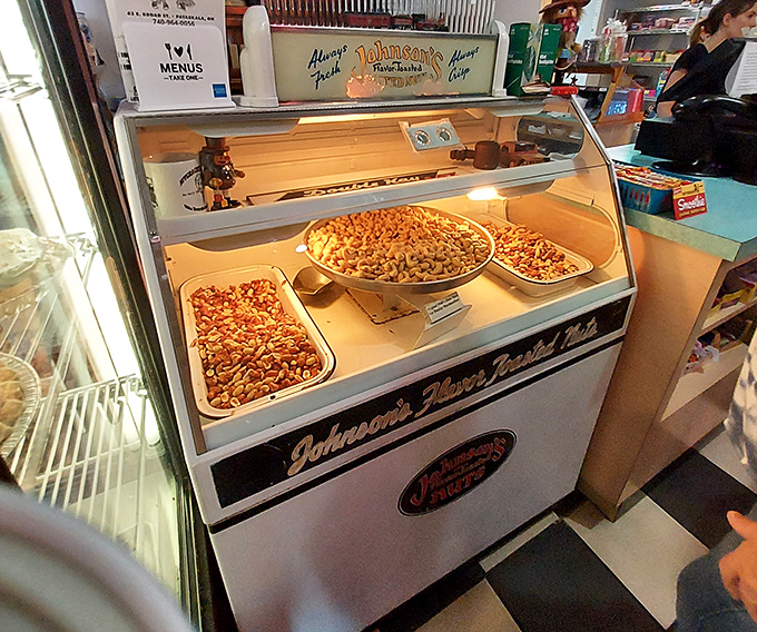 Johnson's New Fashioned Peanuts display case &ndash; because no proper American diner experience is complete without the temptation of freshly roasted nuts.