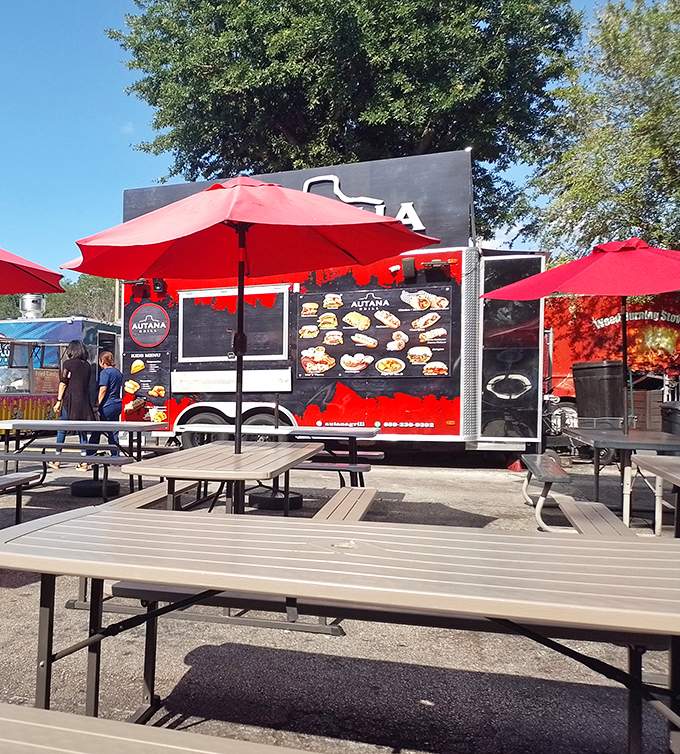 Outdoor dining area with a splash of color &ndash; the perfect spot to rest weary shopping legs and contemplate your next bargain battlefield.
