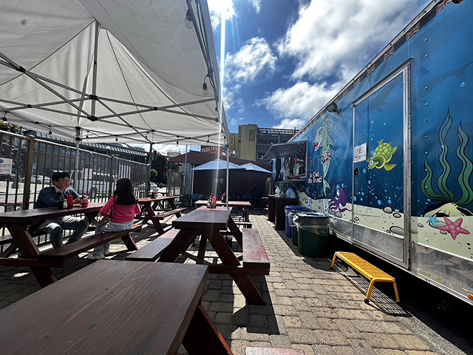 The outdoor dining area where strangers become friends over shared enthusiasm for exceptional seafood and California sunshine.