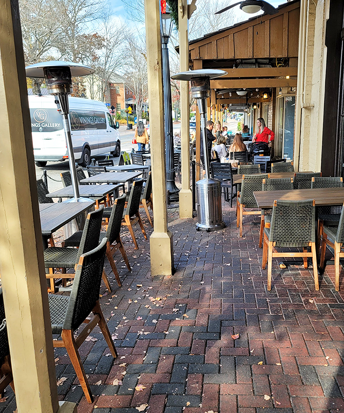 Al fresco dining on historic brick pavers. When Georgia weather cooperates, this charming outdoor space becomes the most coveted real estate in Roswell.