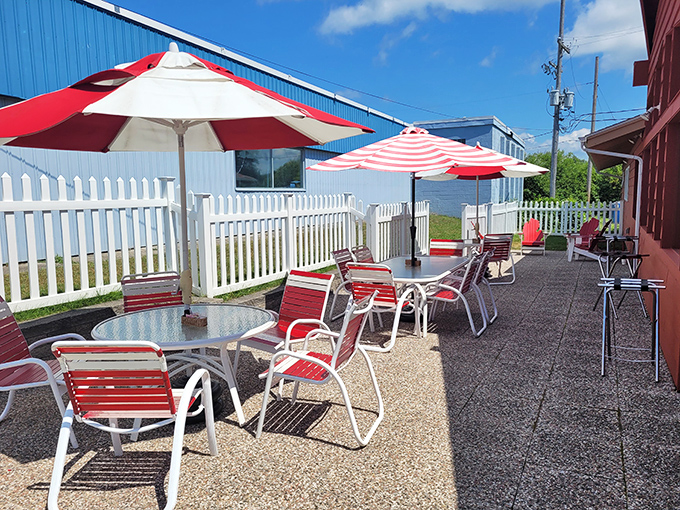 Outdoor seating with those classic red and white umbrellas &ndash; like sitting in a Norman Rockwell painting that serves really good pie.