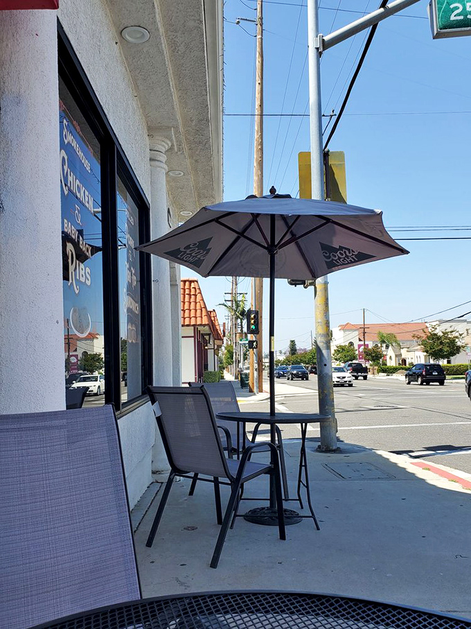 Sidewalk seating under California sunshine. Sometimes the best BBQ moments happen outdoors, with sauce on your fingers and happiness in your heart.