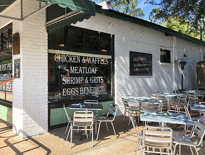 Outdoor seating that advertises the greatest hits on the windows. "Chicken & Waffles" and "Meatloaf" aren't just menu items&mdash;they're promises.
